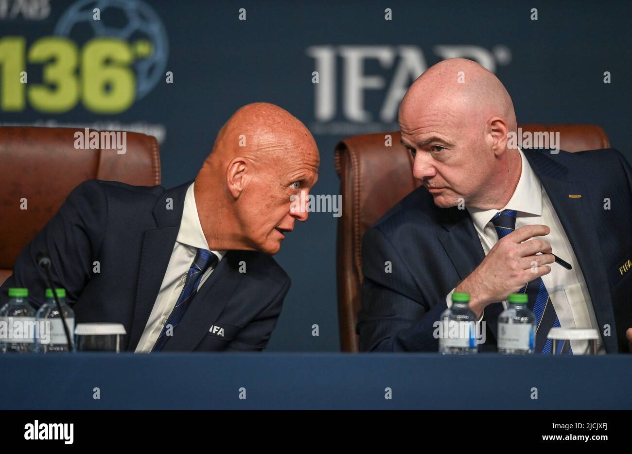 Doha, Qatar. 13th June, 2022. FIFA President Gianni Infantino (R) and ...