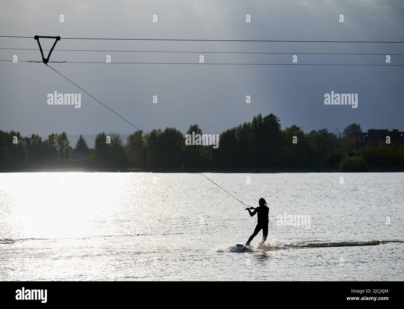 Silhouette wakeboarder in action hi-res stock photography and images ...