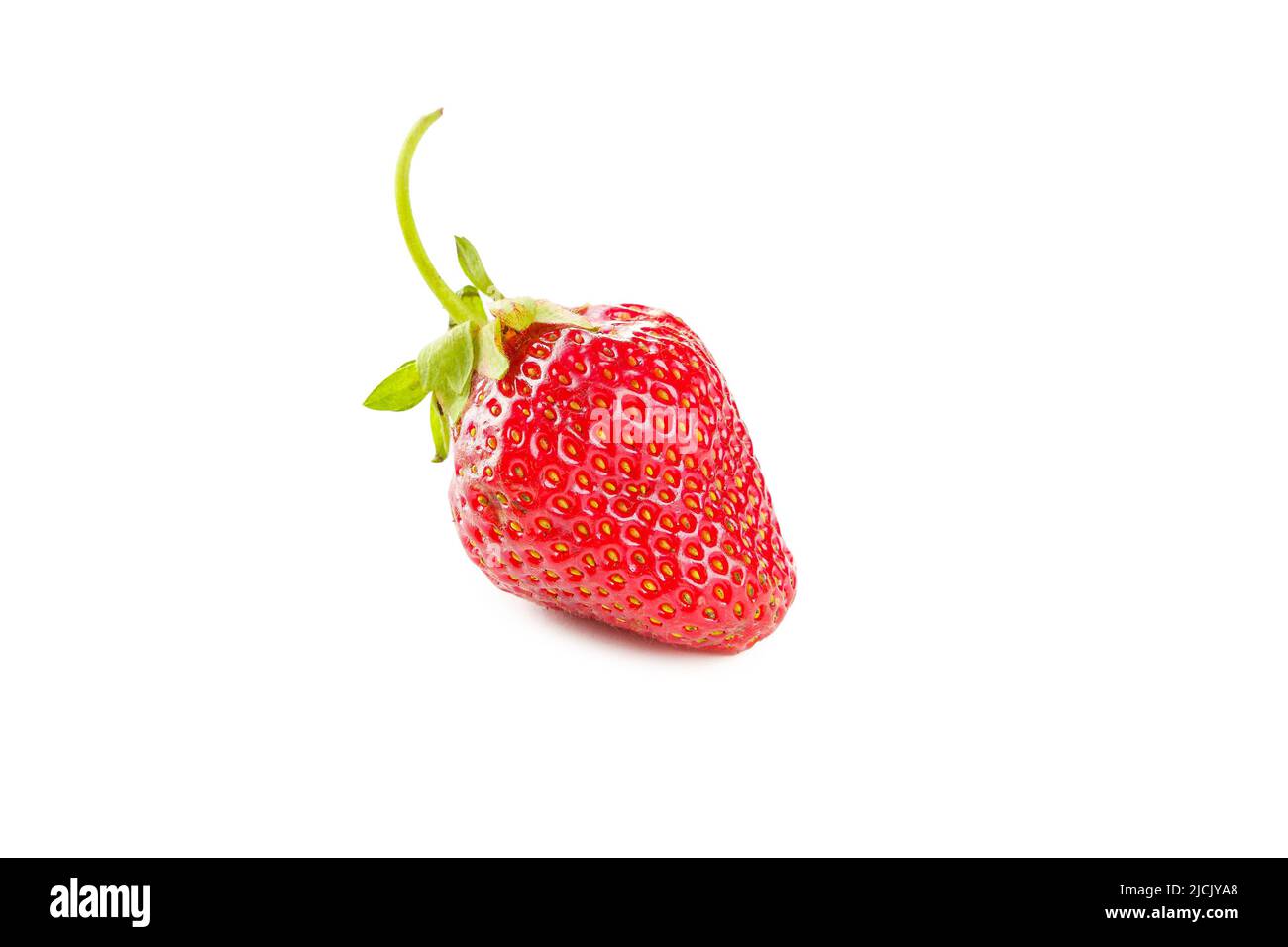 Ripe red strawberry fruit with green leaves isolated on white ...