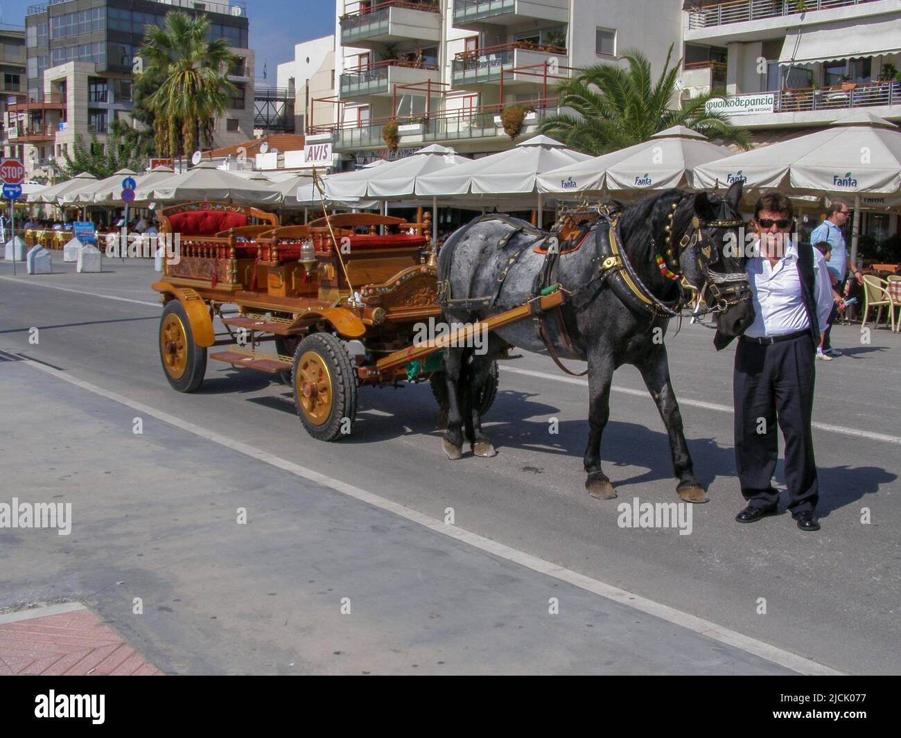 A coachman and his horse carriage Stock Photo - Alamy