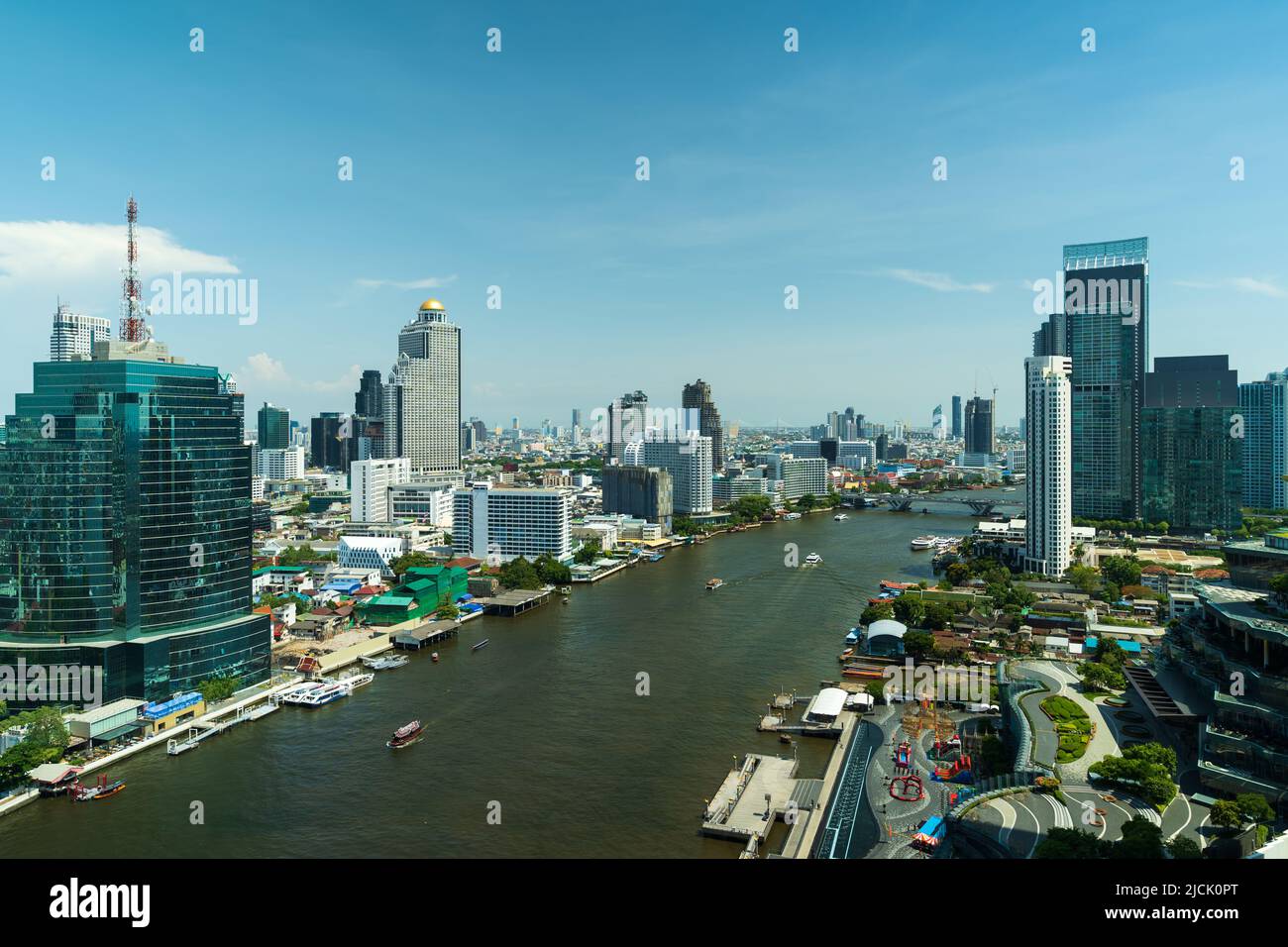 Chao Phraya River with King Taksin bridge and building of Bangkok city ...