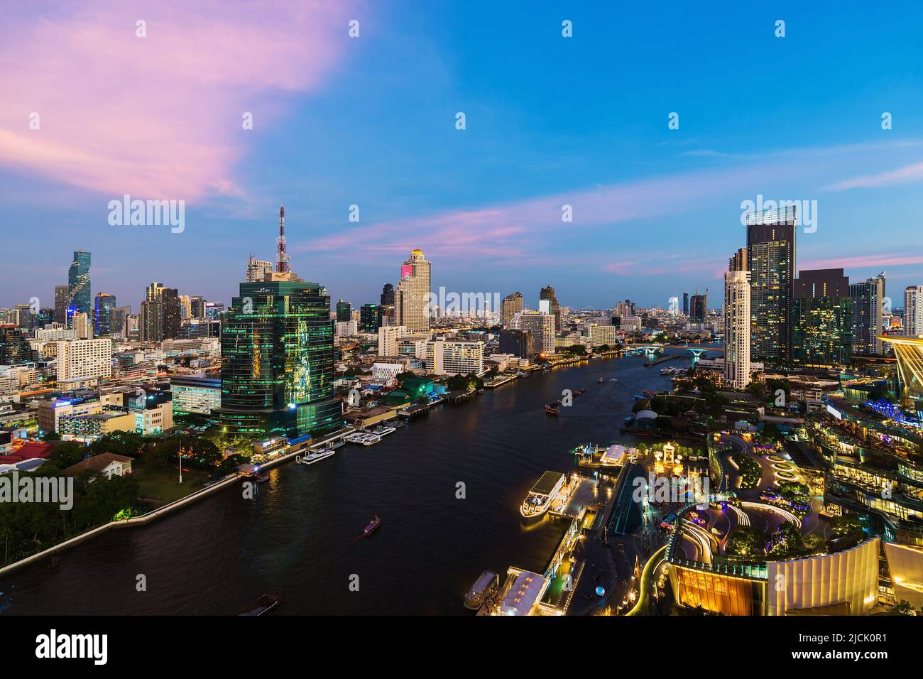 Chao Phraya River with King Taksin bridge and building of Bangkok city ...