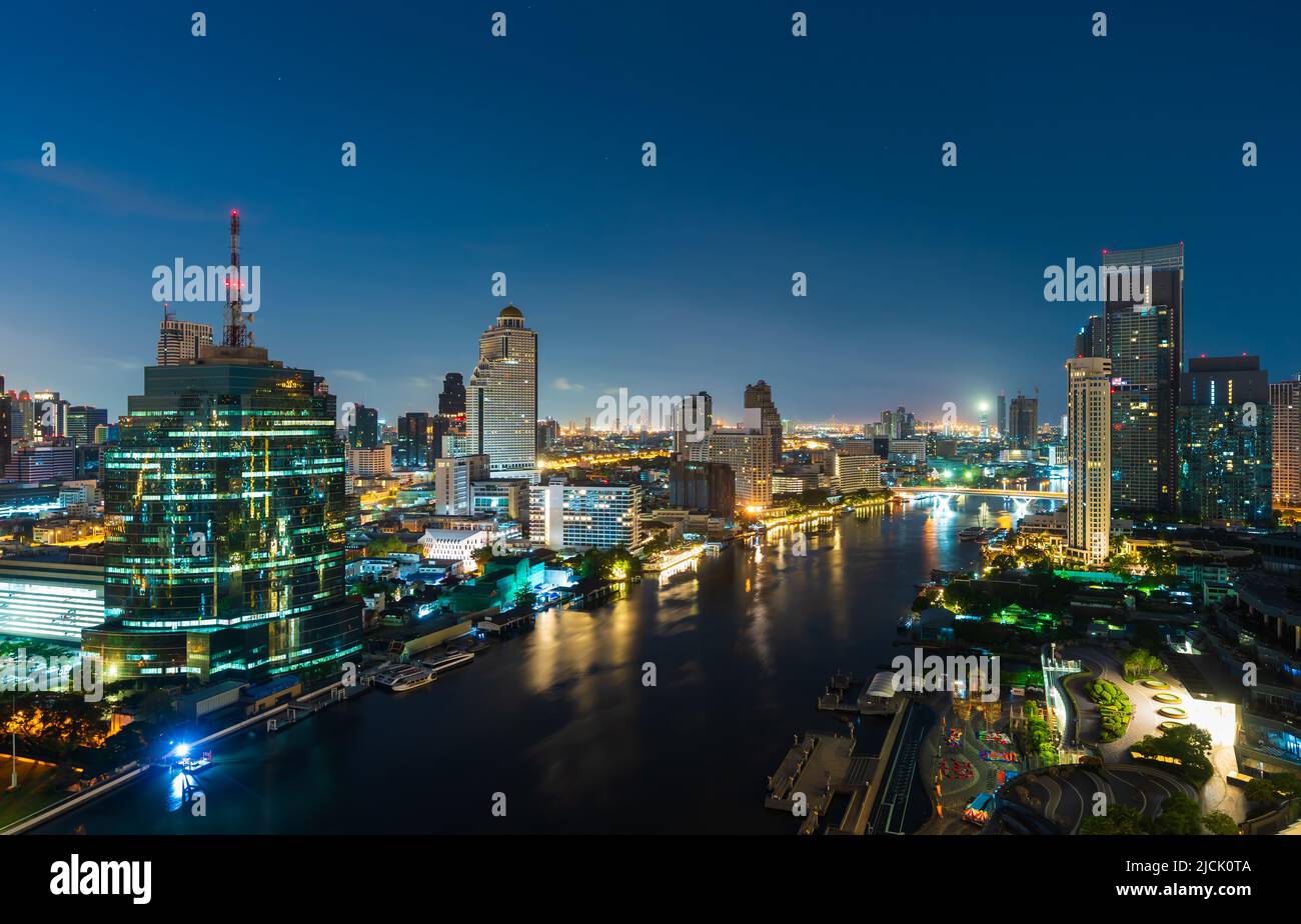 Chao Phraya River with King Taksin bridge and building of Bangkok city ...