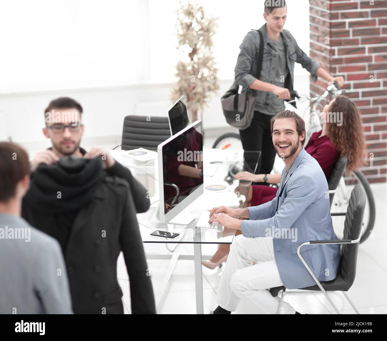 group of designers and tailors working in the Studio Stock Photo - Alamy