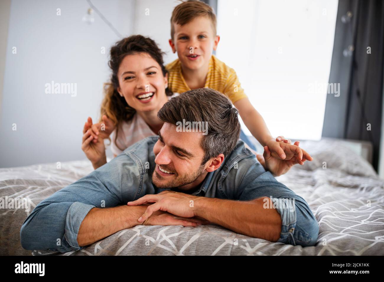 Happy family spending time together, having fun at home Stock Photo - Alamy