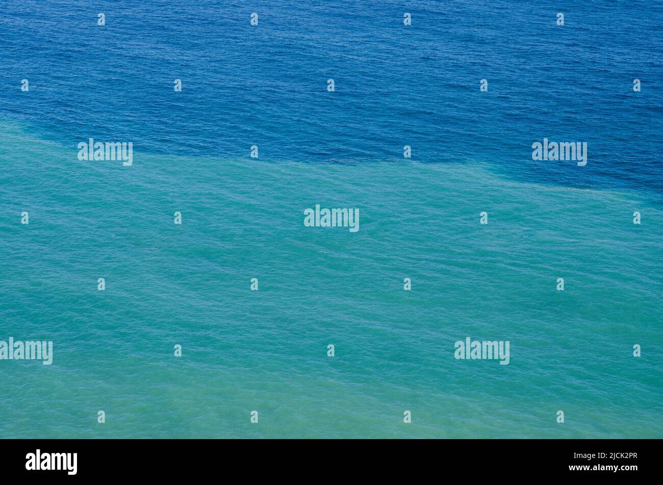 Two-color seawater background. Caribbean Sea. Copy space. Blue and ...