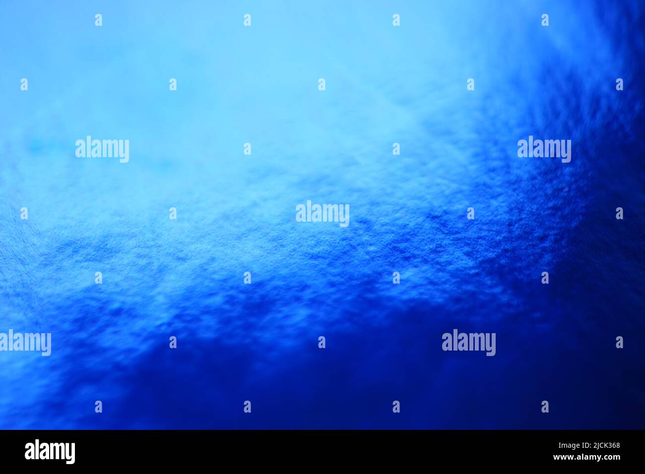 Bright blue shiny background. Indigo color Stock Photo - Alamy