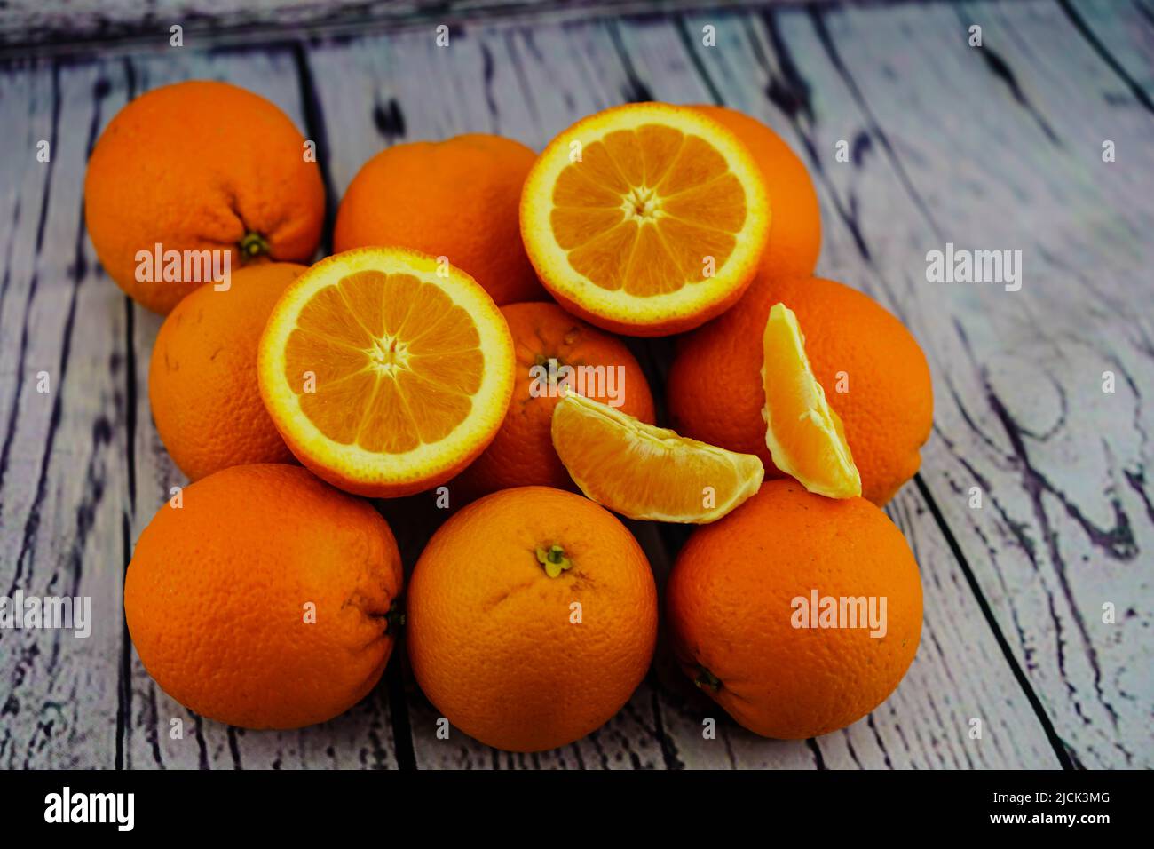 A stack of fresh sliced orange fruits Stock Photo - Alamy