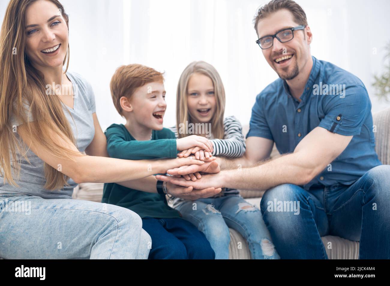 close-knit family showing their unity Stock Photo - Alamy