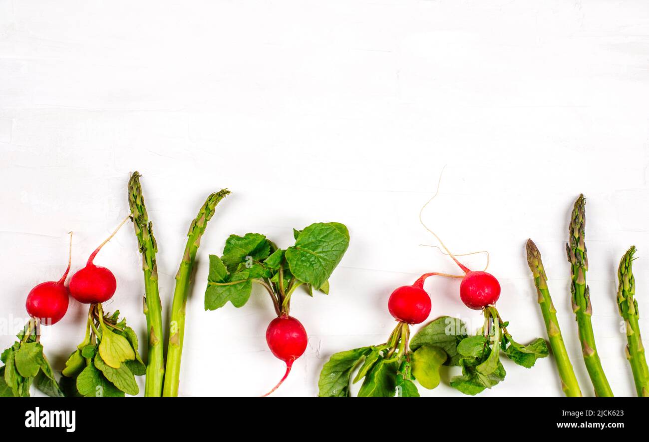 Fresh spring vegetables on white background, copy space Stock Photo - Alamy