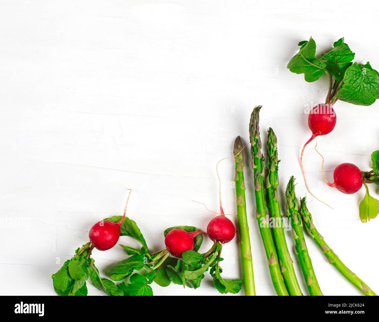 Fresh spring vegetables on white background, copy space Stock Photo - Alamy
