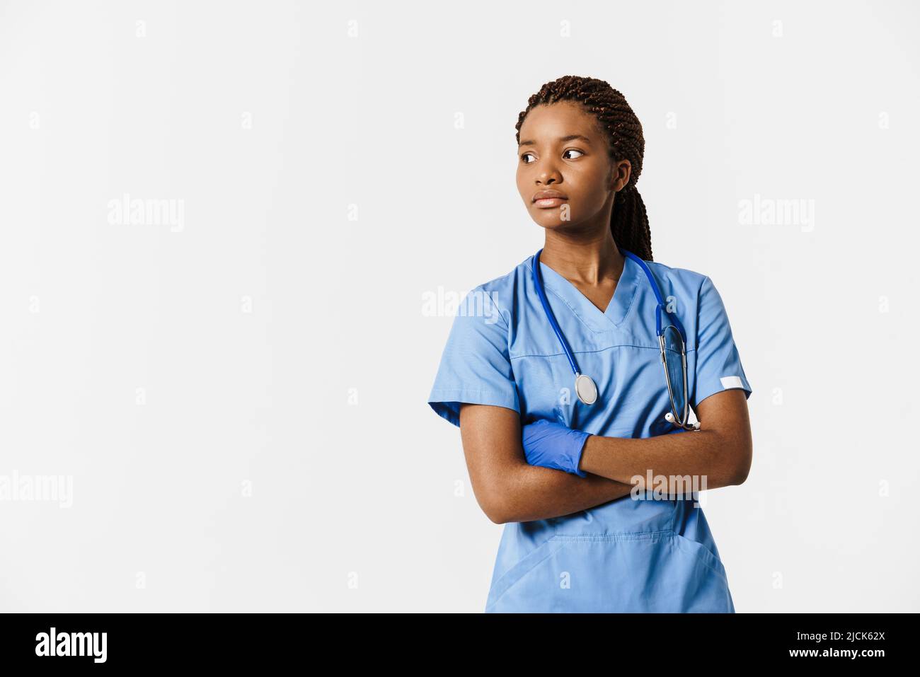 Young black doctor wearing uniform posing with stethoscope isolated ...