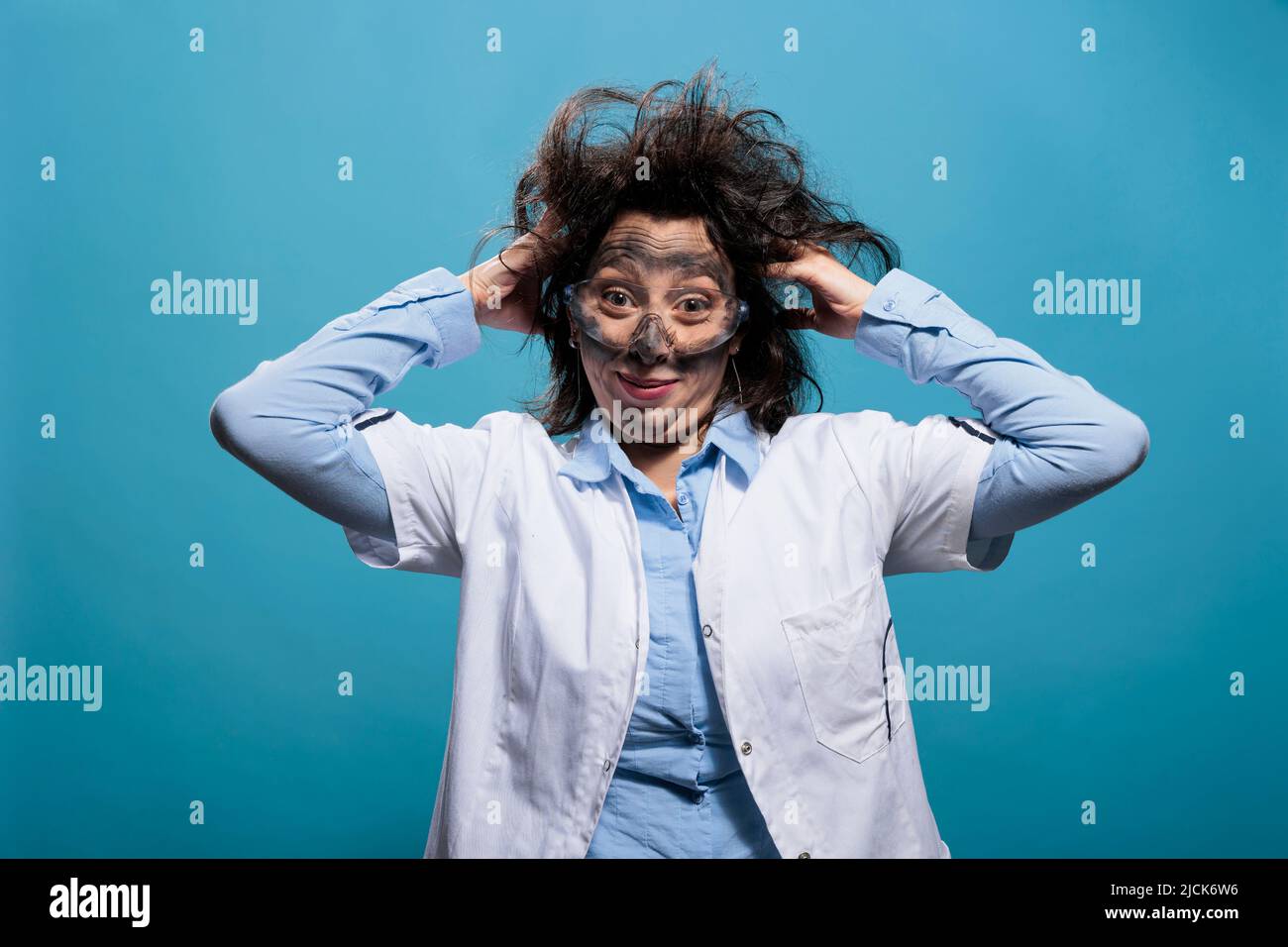 Crazy chemist with goofy appearance feeling guilty for explosion ...