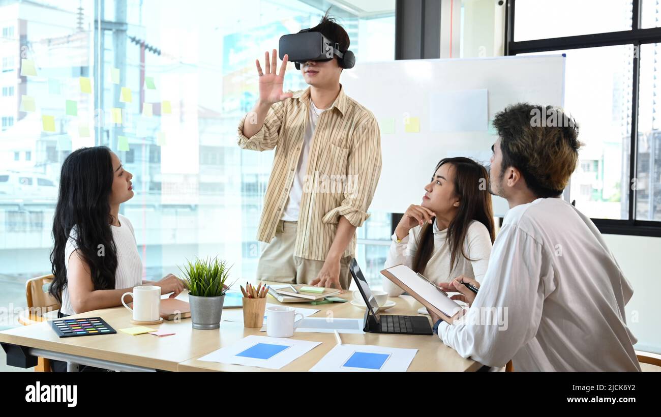 Team of professional developers is brainstorming for augmented reality ...