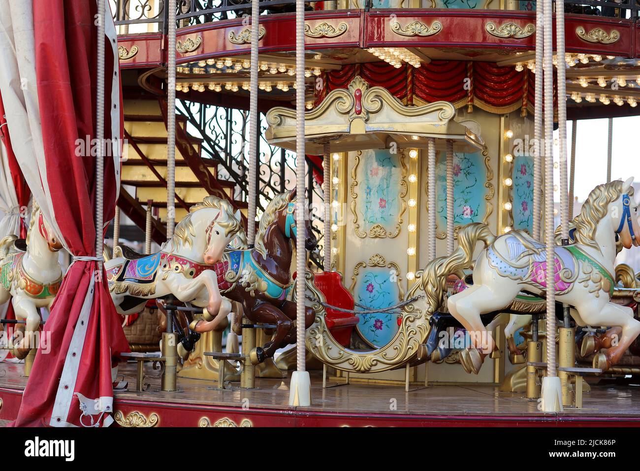 animals roundabout carousel in amusement park. family weekend or ...