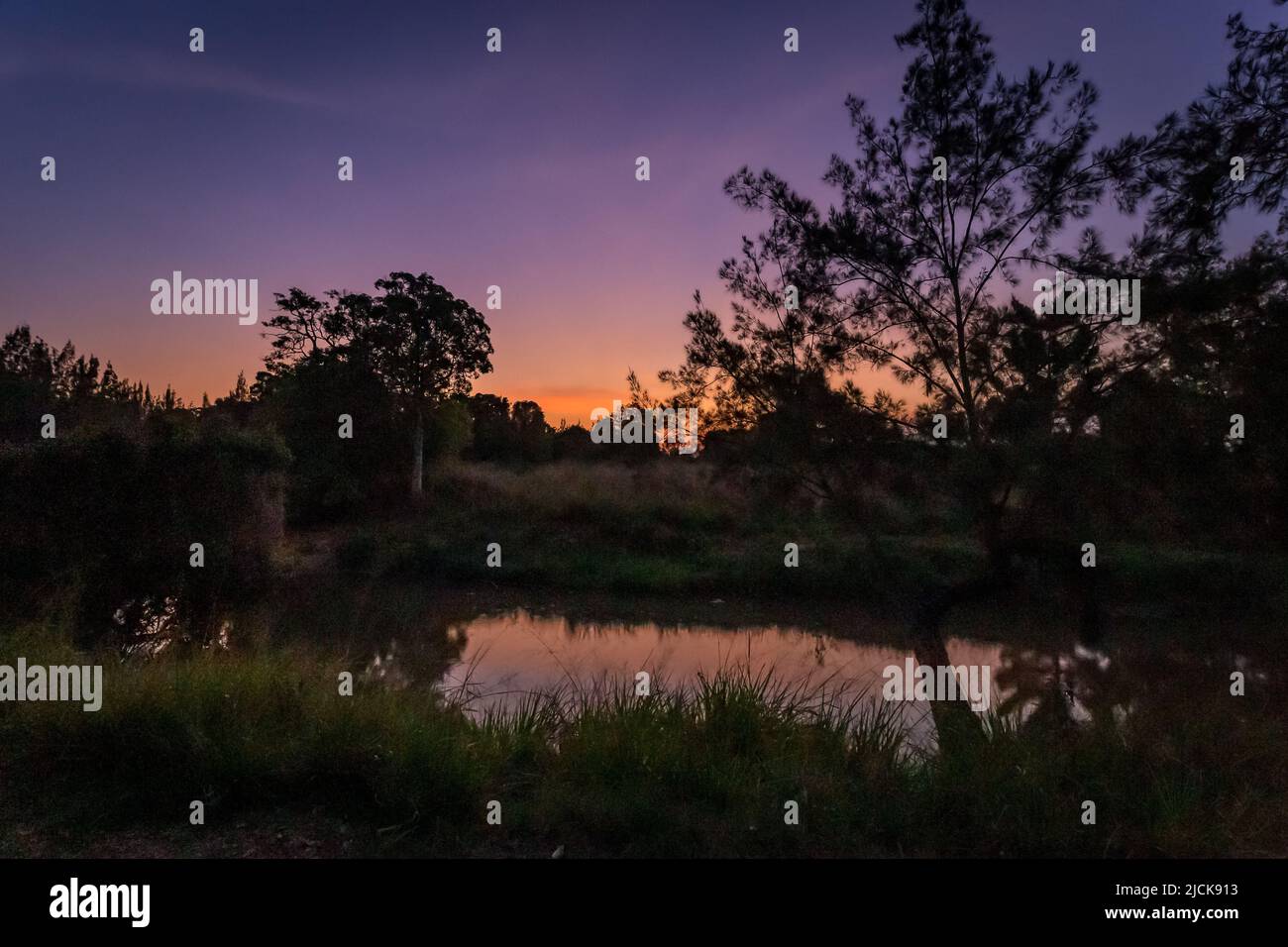 Beautiful Sunset above Peterson Creek River, Yungaburra, Queensland ...