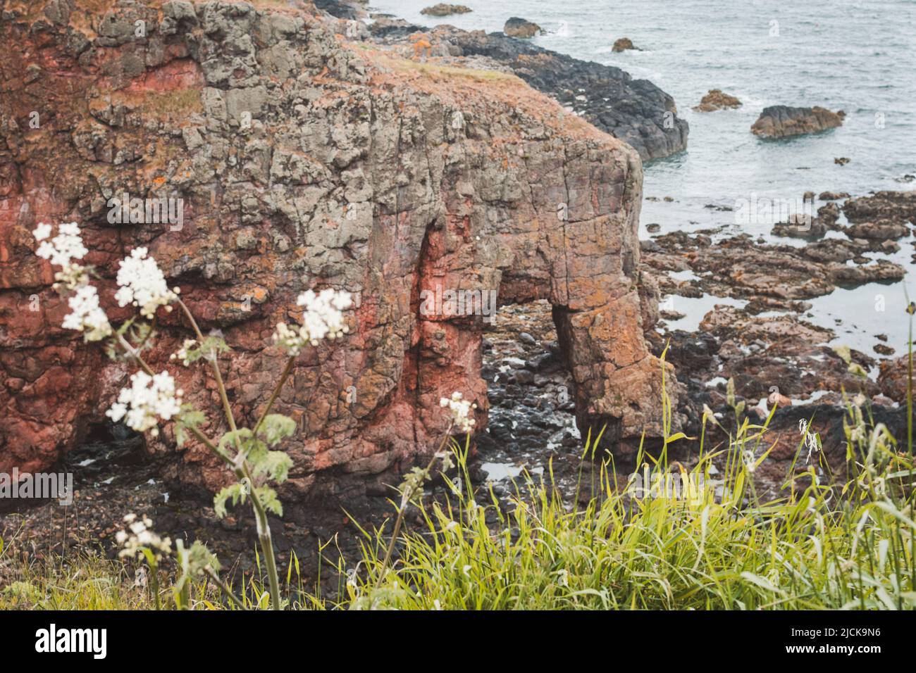 Rock outcrop in sea hi-res stock photography and images - Alamy