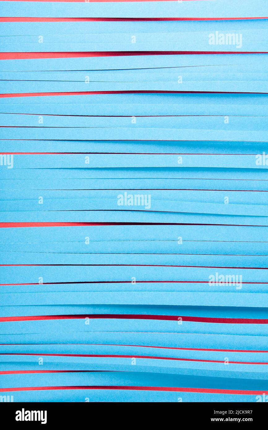 Blue paper strips background. Blue paper strips on red Stock Photo - Alamy