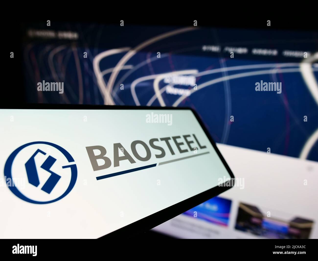 Smartphone with logo of Chinese steel company Baosteel Group on screen ...