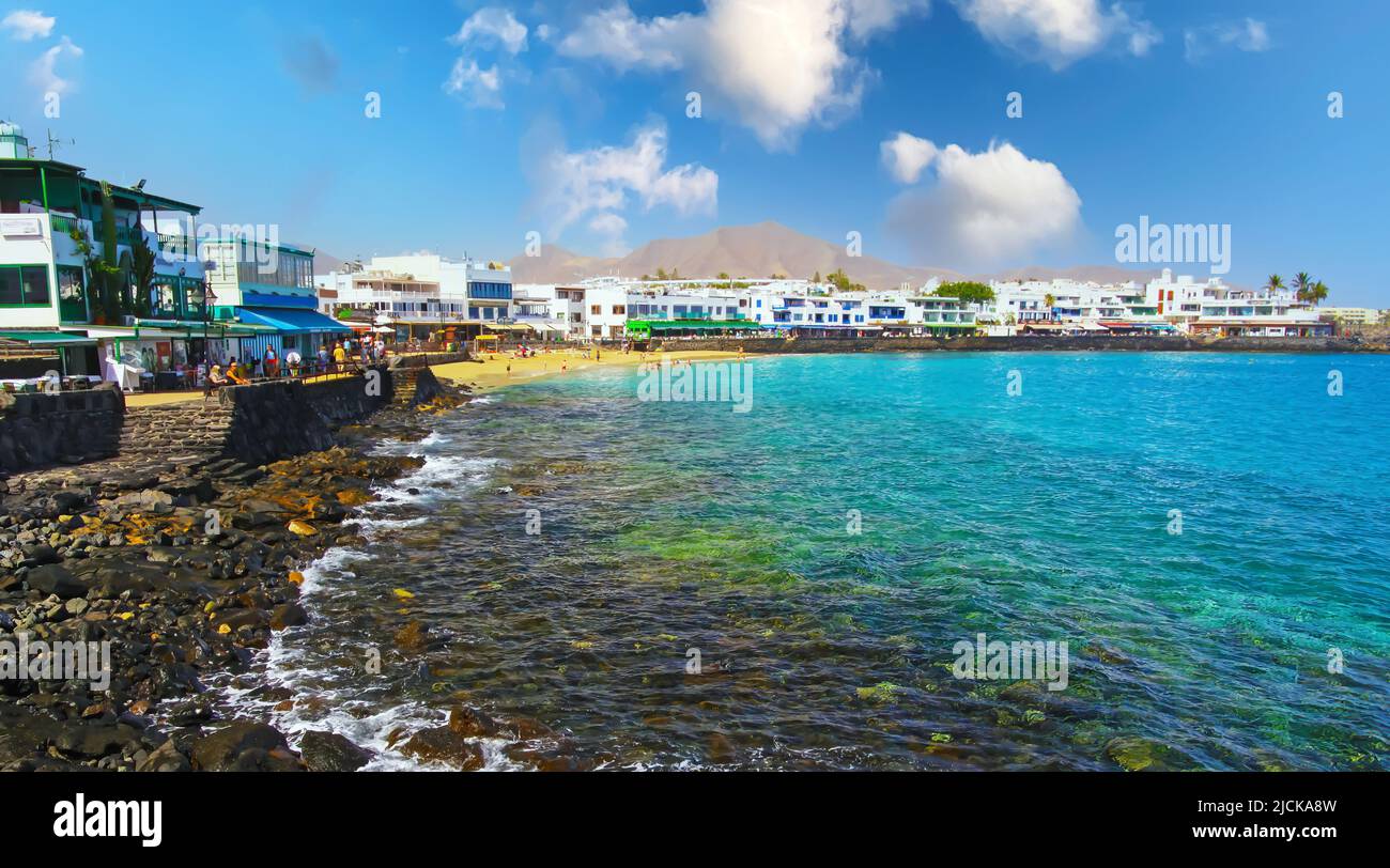 Beautiful spanish canarian coastal town, turquoise sea water, seaside ...
