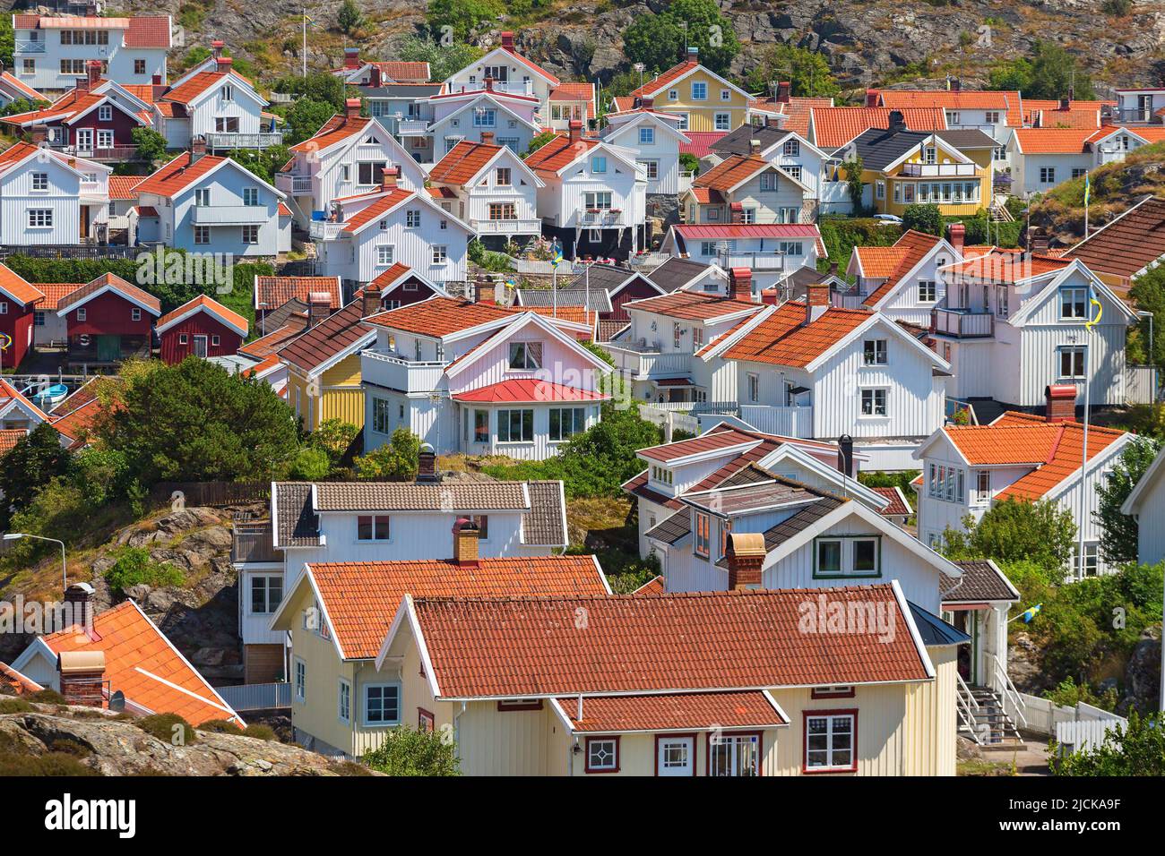 View over the rooftops in a coastal village in Sweden Stock Photo - Alamy