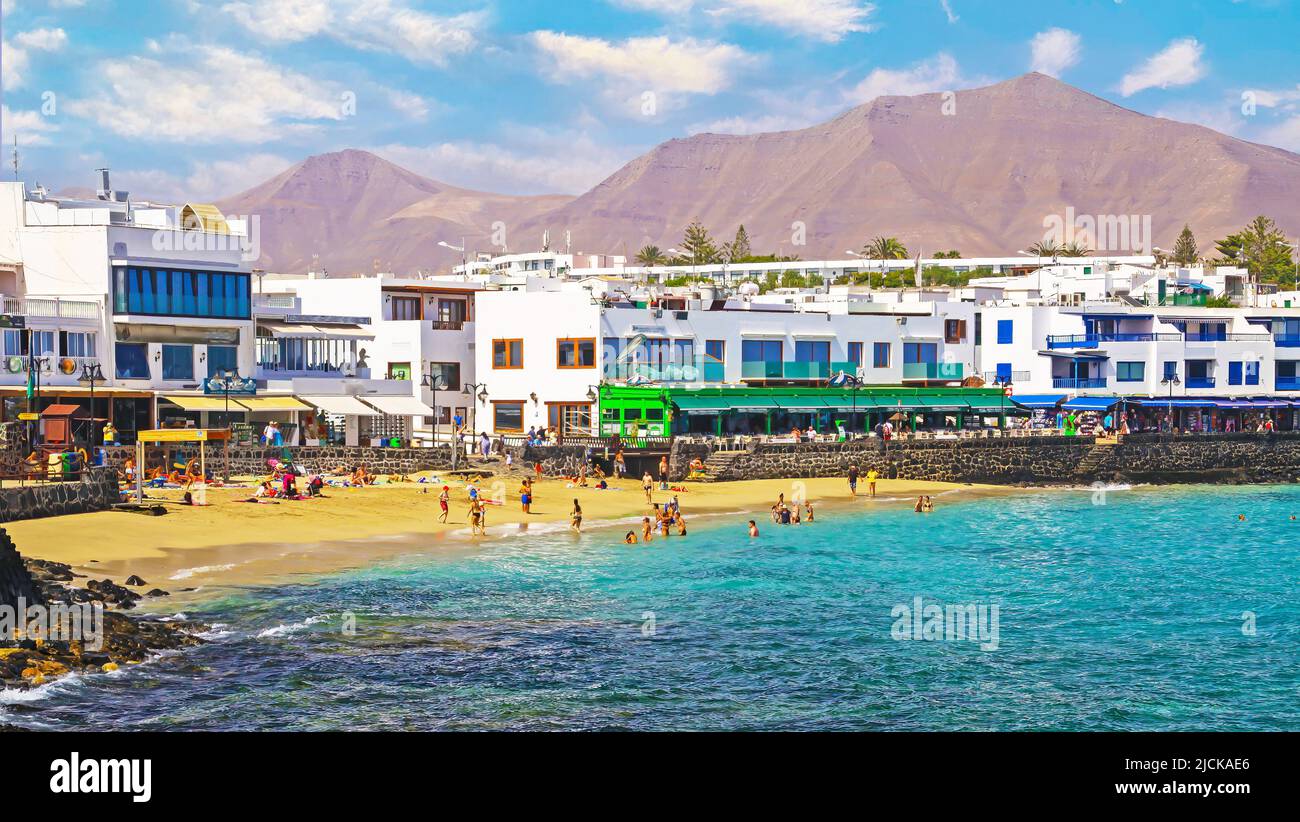 Beautiful spanish canarian coastal town, turquoise sea water, seaside ...