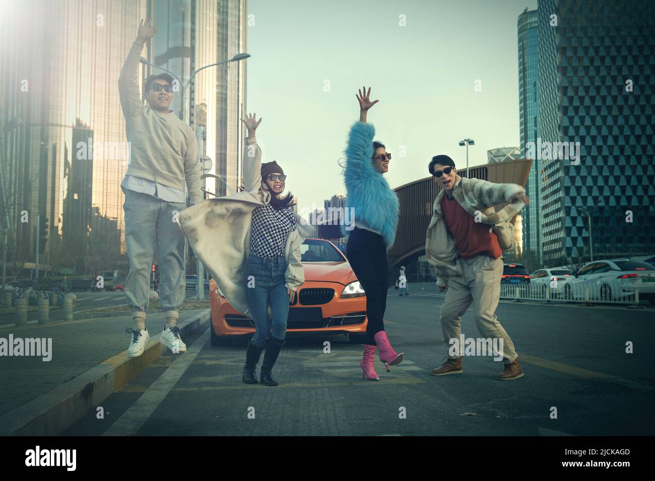 Excited young chinese friends hi-res stock photography and images - Alamy