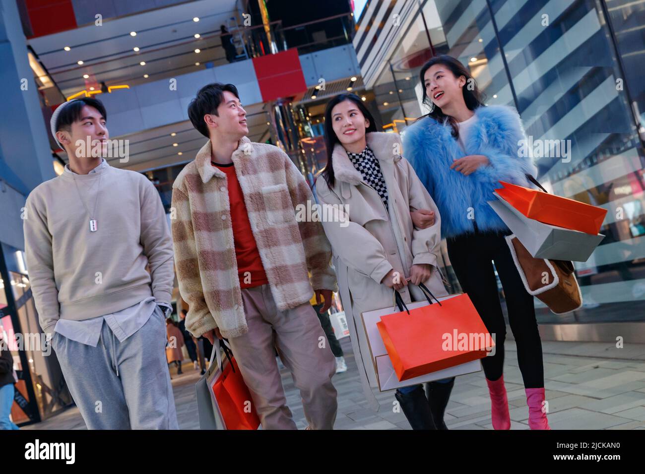 Young couple walking downtown night hi-res stock photography and images ...