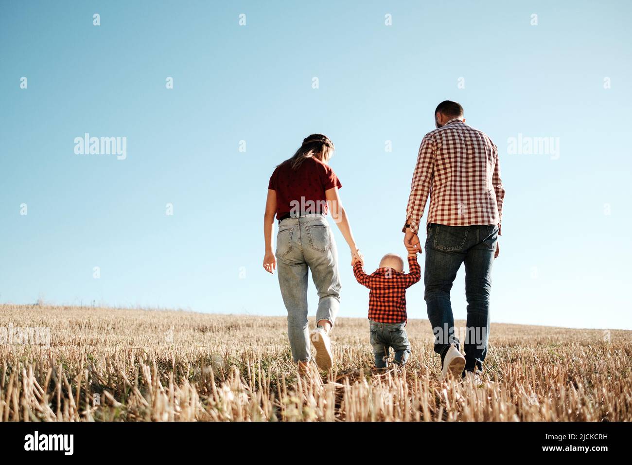 Happy Young Family Mom and Dad with Their Little Son Enjoying Summer ...