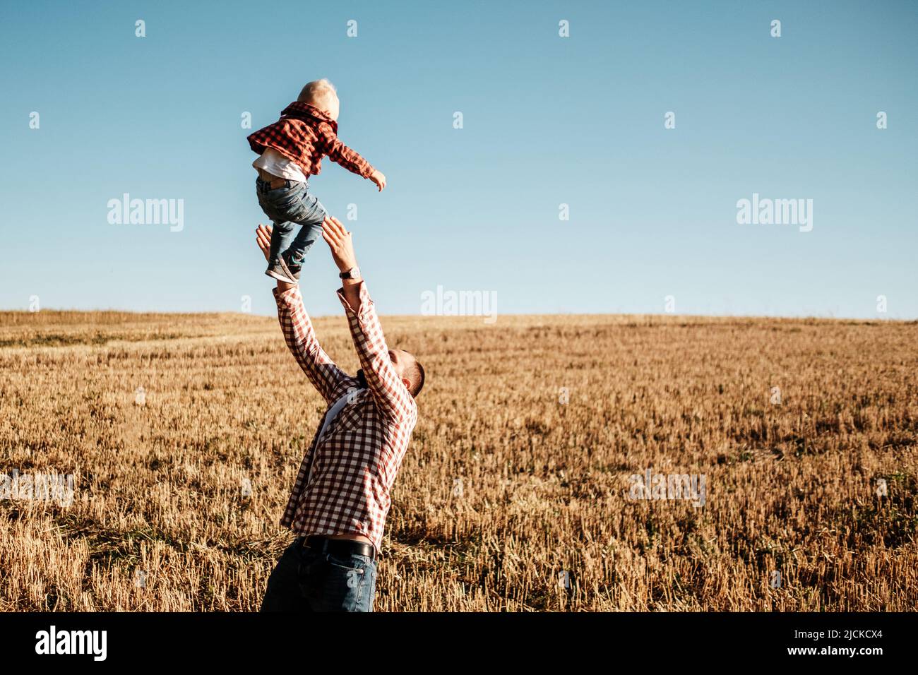 Happy Dad with His Little Son Enjoying Summer Weekend Outside the City ...