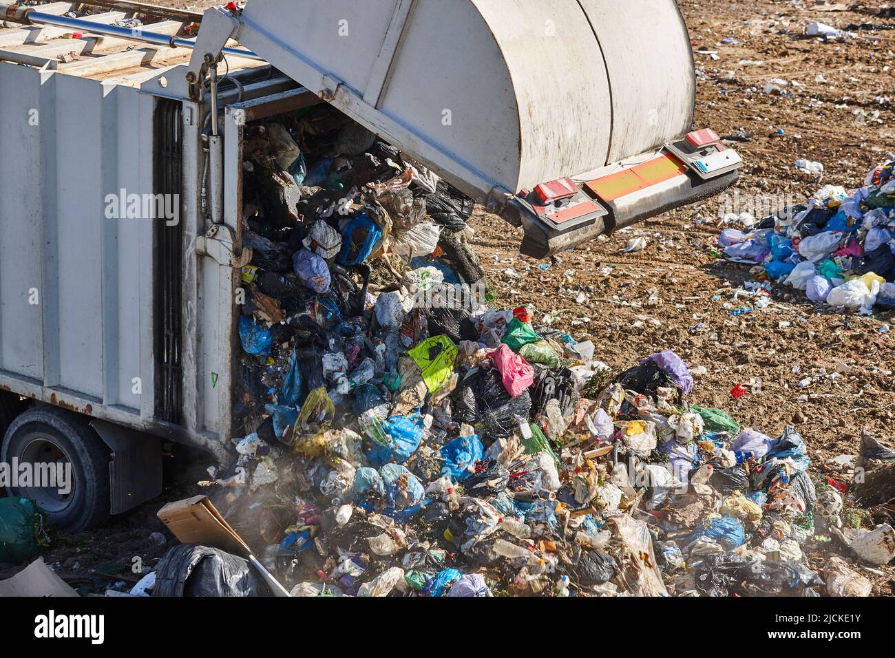 Truck unloading garbage on an open air dump. Waste recycling Stock ...
