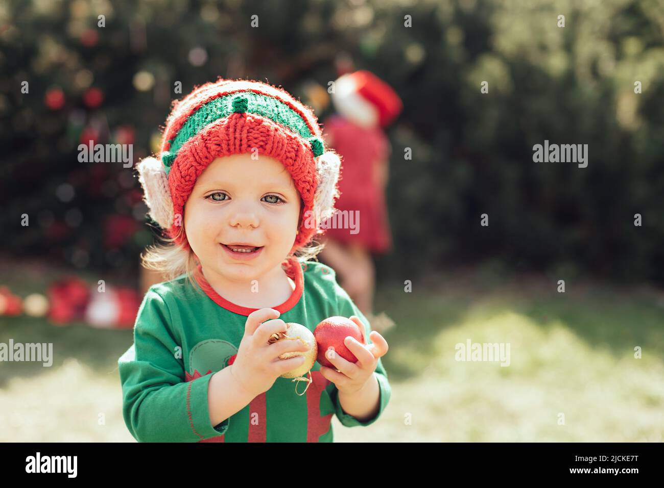 Christmas in july. children elf ears. Child waiting for Christmas in ...