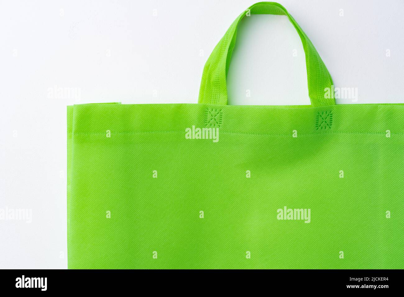 Empty fabric shopping bag on white background Stock Photo - Alamy