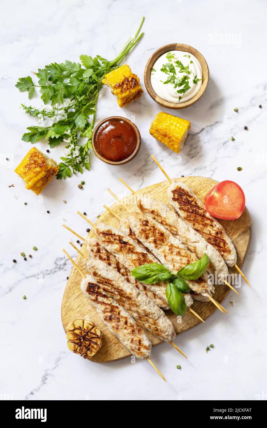 Summer party food. Grill food menu. Bbq grilled chicken kebab with ...