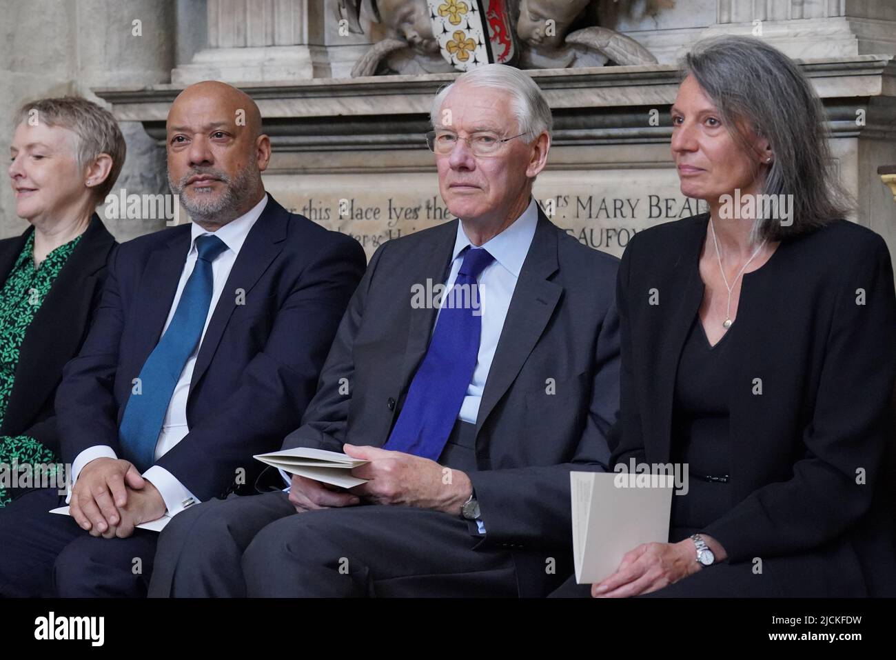 Sir Martin Moore-Bick (centre) at the Grenfell fire memorial service at ...