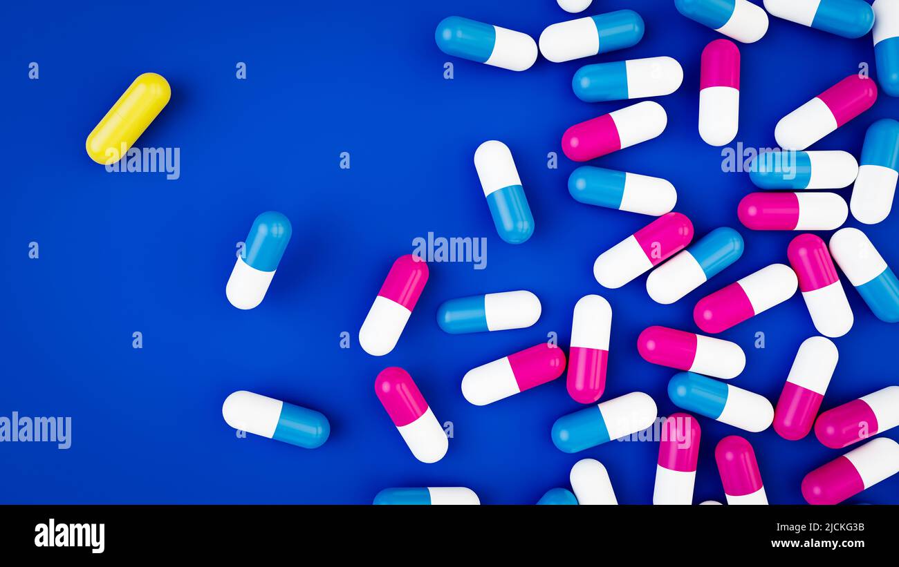 Capsule pills red and blue and one yellow for medicine and healthcare ...