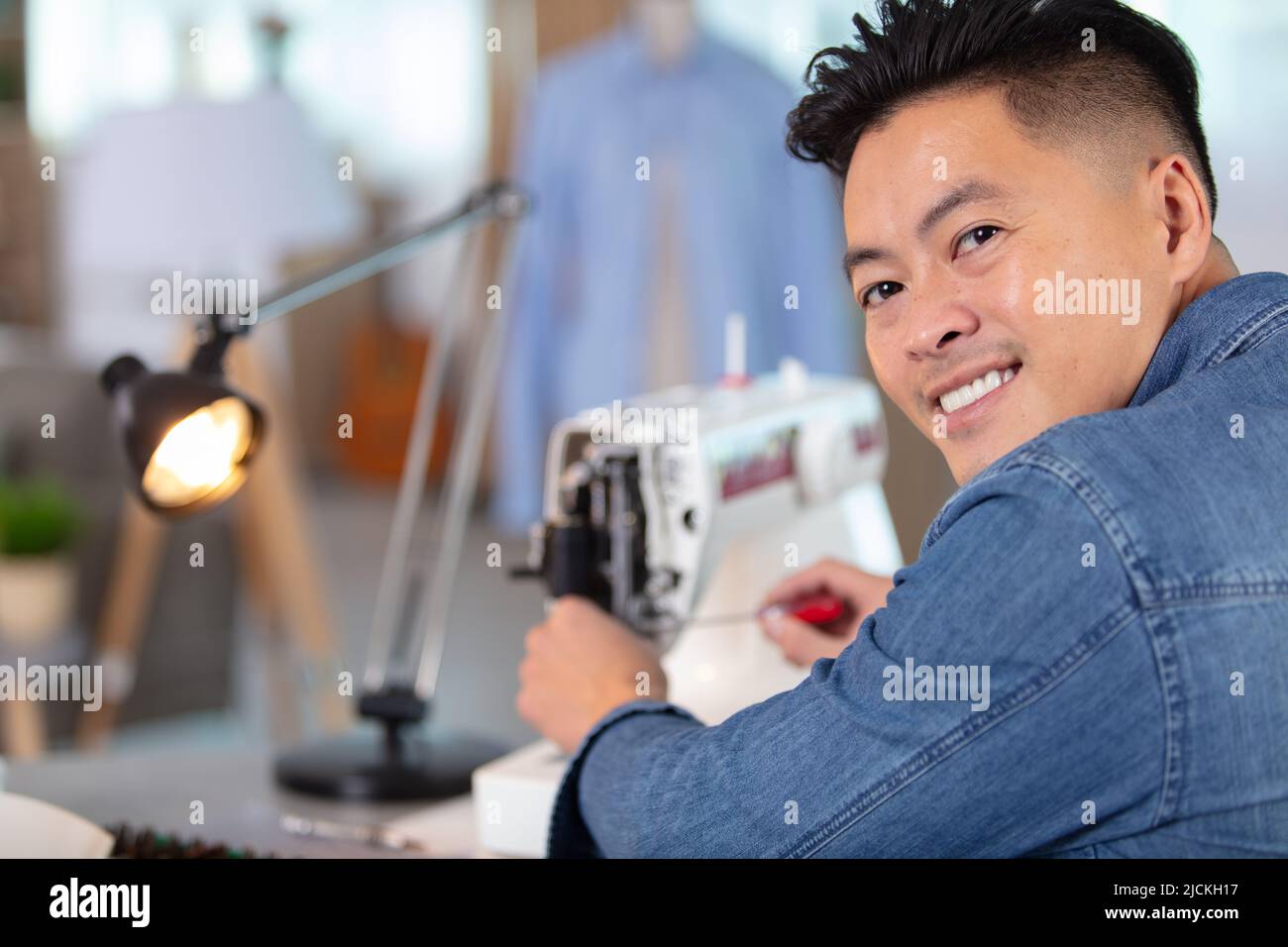 Repairman repairing sewing machine hi-res stock photography and images ...
