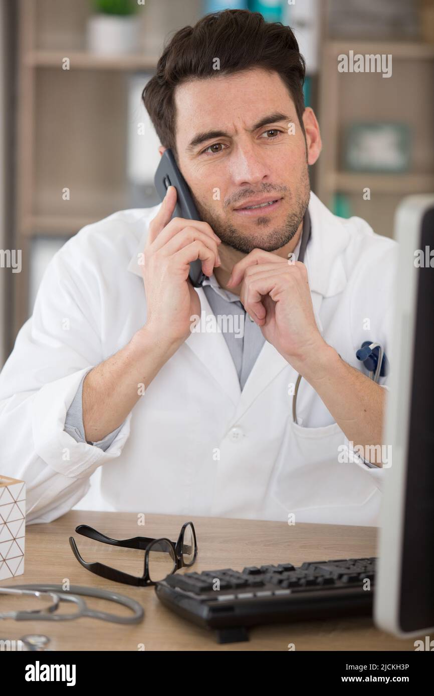 Gp doctor phone call hi-res stock photography and images - Alamy