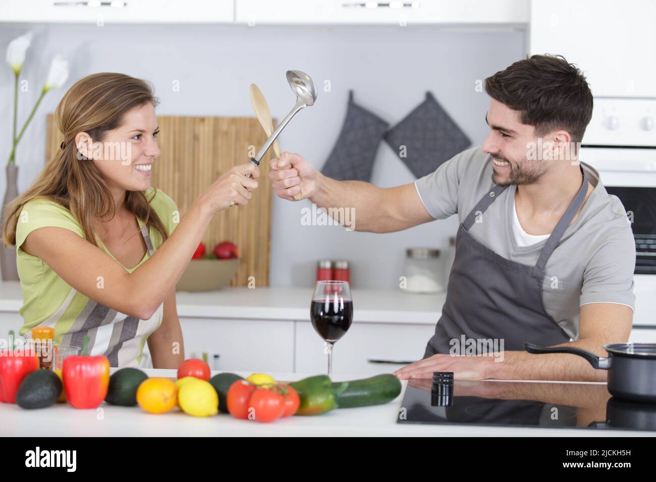 Funny couple dancing in kitchen hi-res stock photography and images - Alamy