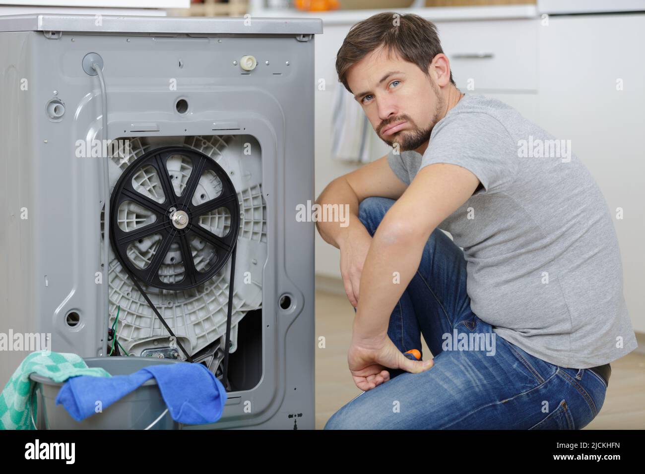 Broken washing machine hi-res stock photography and images - Alamy