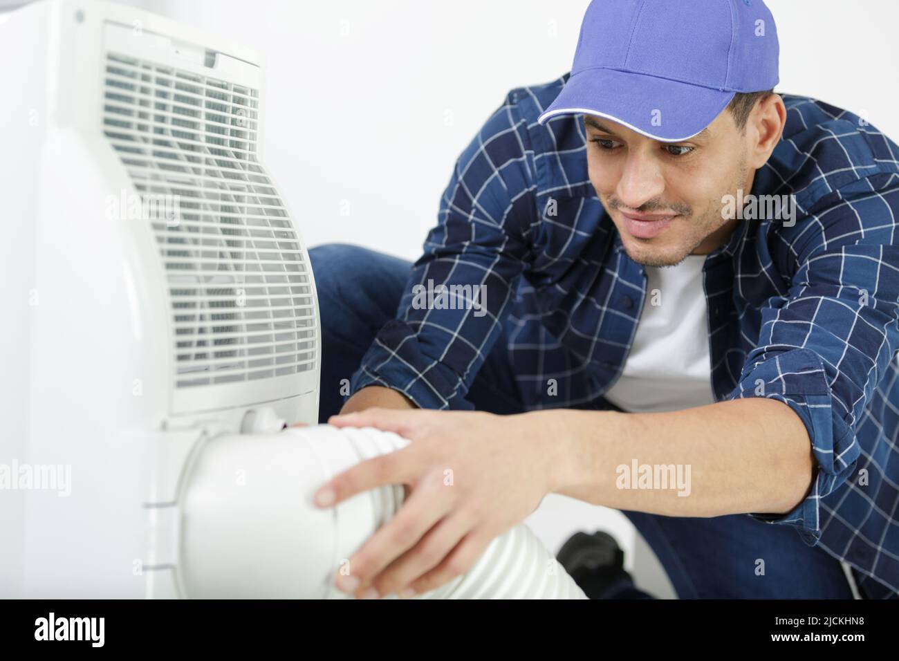 Happy young engineer gesturing hi-res stock photography and images - Alamy
