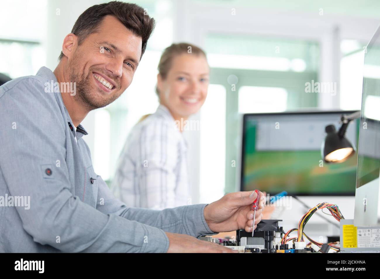 executive manager mentor teaching intern employee Stock Photo - Alamy