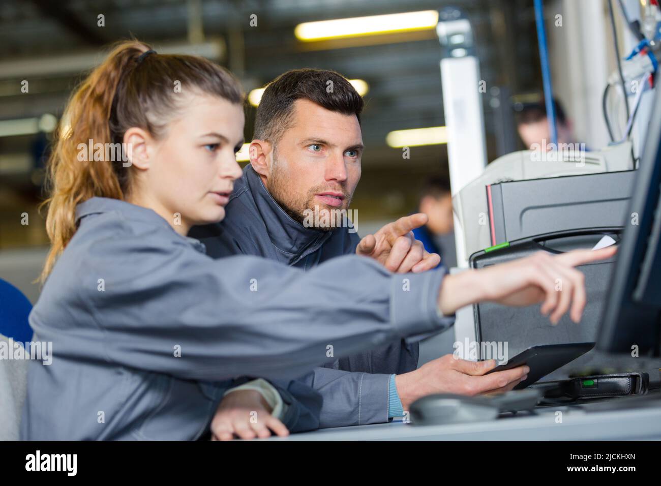 Man fixing sheet paper hi-res stock photography and images - Alamy