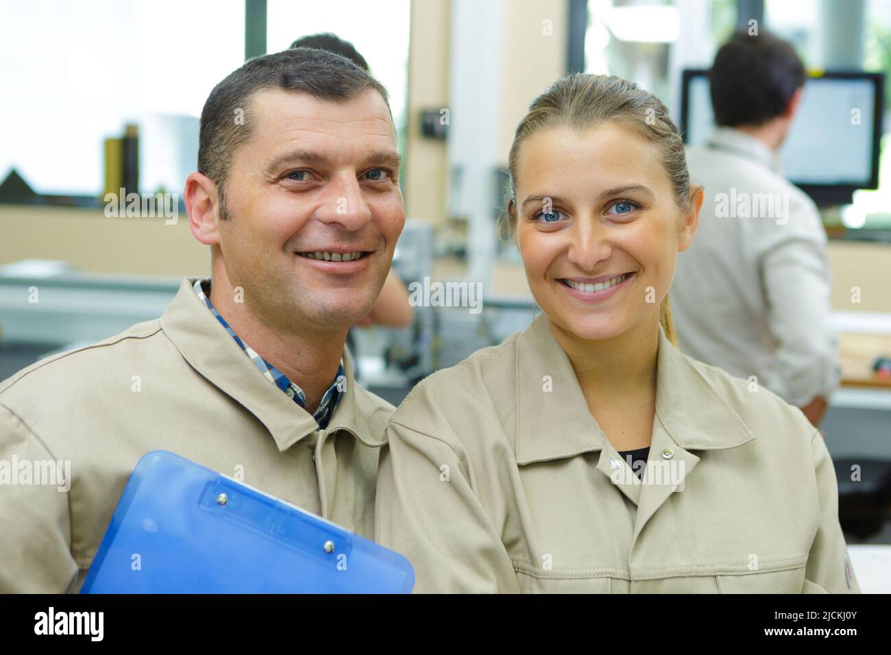 portrait of happy manager and female apprentice Stock Photo - Alamy