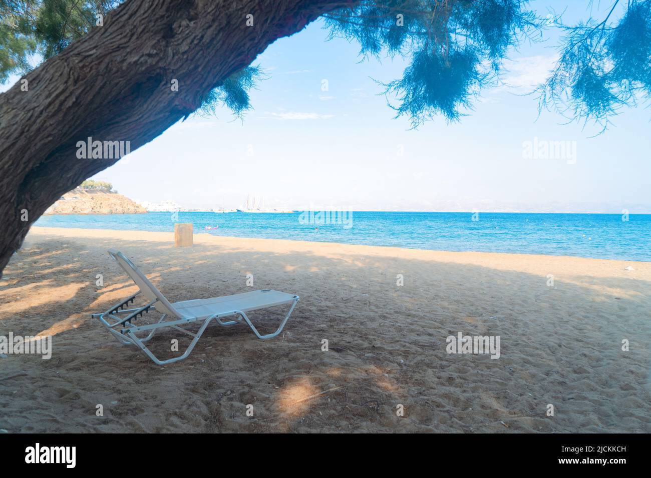 Romantic beach at greek island Stock Photo - Alamy