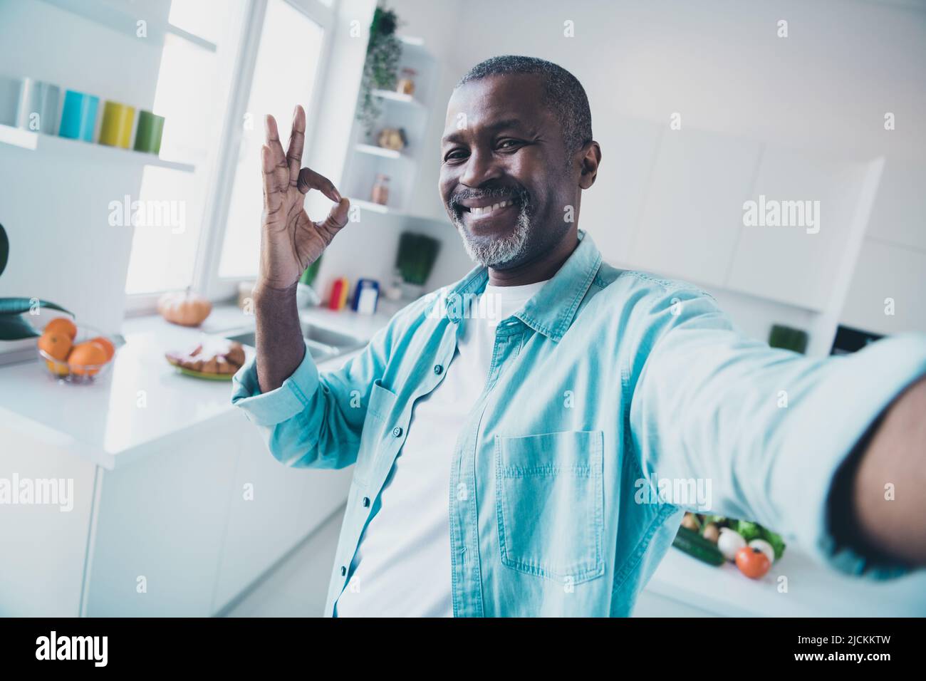 Photo of positive aged man make selfie okay symbol advise good ...