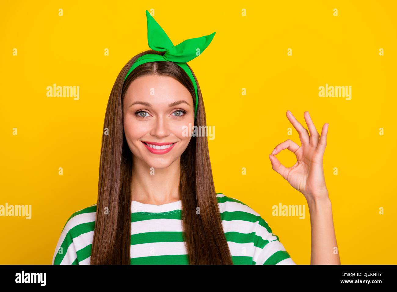 Photo of positive charming girl arm fingers demonstrate okey symbol ...