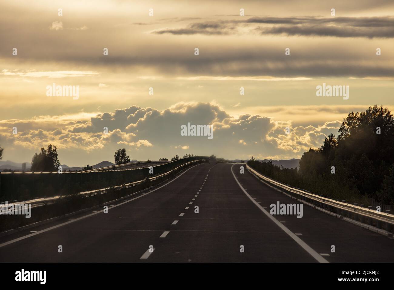 Road grassland hi-res stock photography and images - Alamy