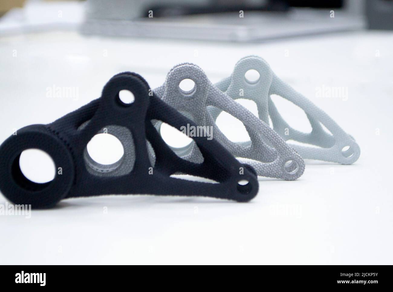 Models printed on 3D printer isolated on white background. Objects ...