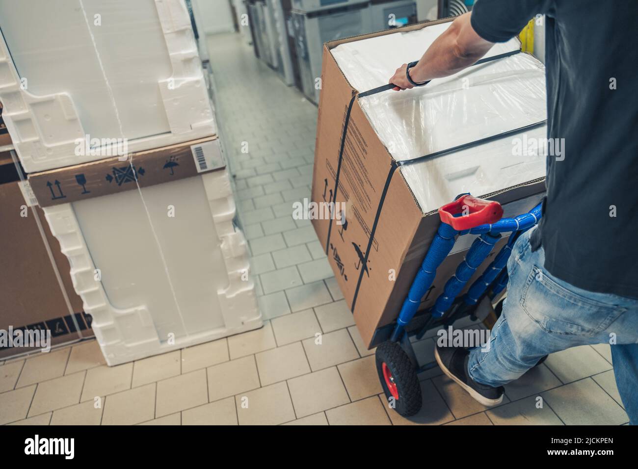 Loading in refrigerator hi-res stock photography and images - Alamy